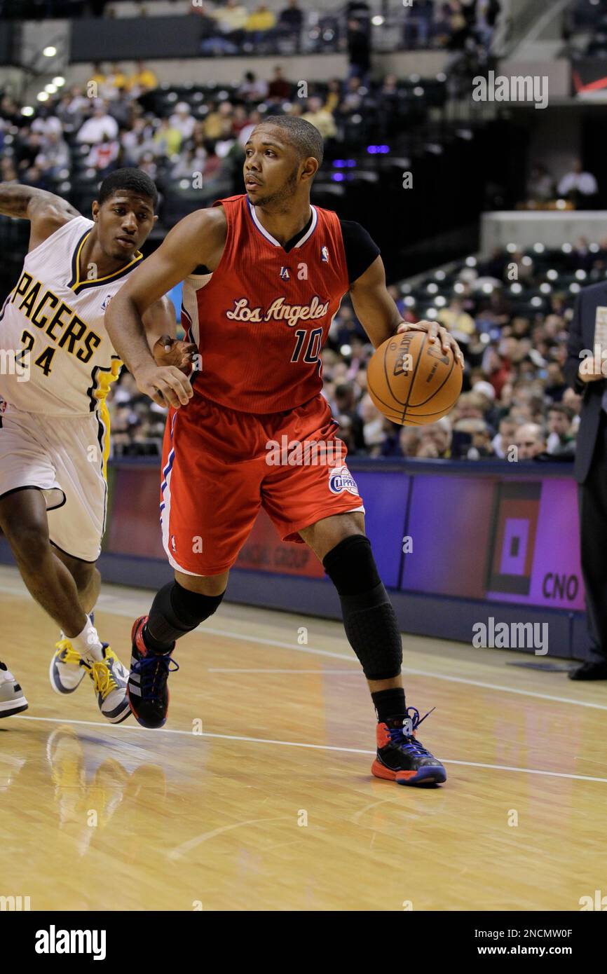 Los Angeles Clippers guard Eric Gordon, right, drives past Indiana ...