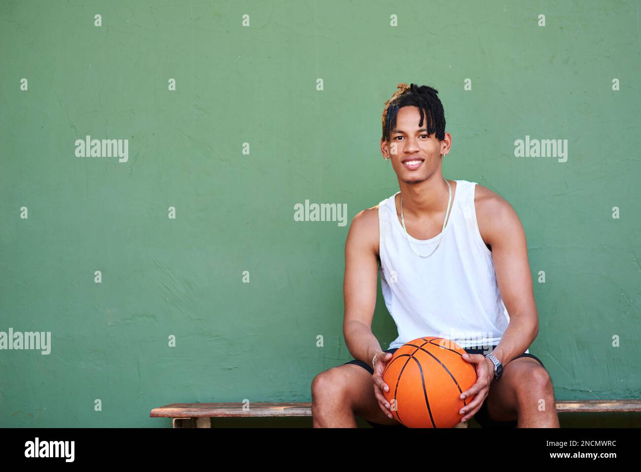 Basketball makes you a better person. Portrait of a sporty young man ...