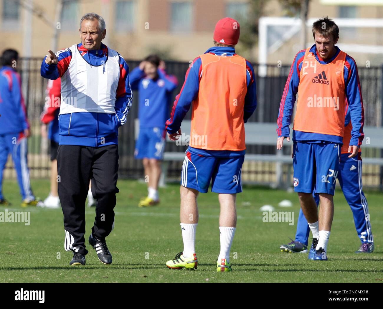 FC Dallas head coach Schellas Hyndman, left, instructs his team during ...