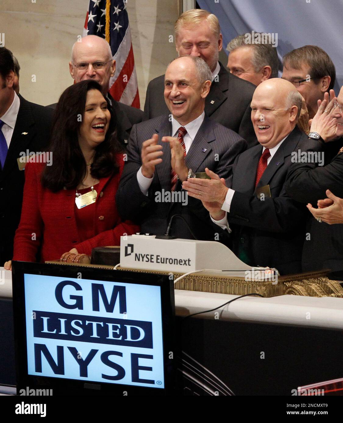 General Motors Co. CEO Dan Akerson, right, and other dignitaries ...