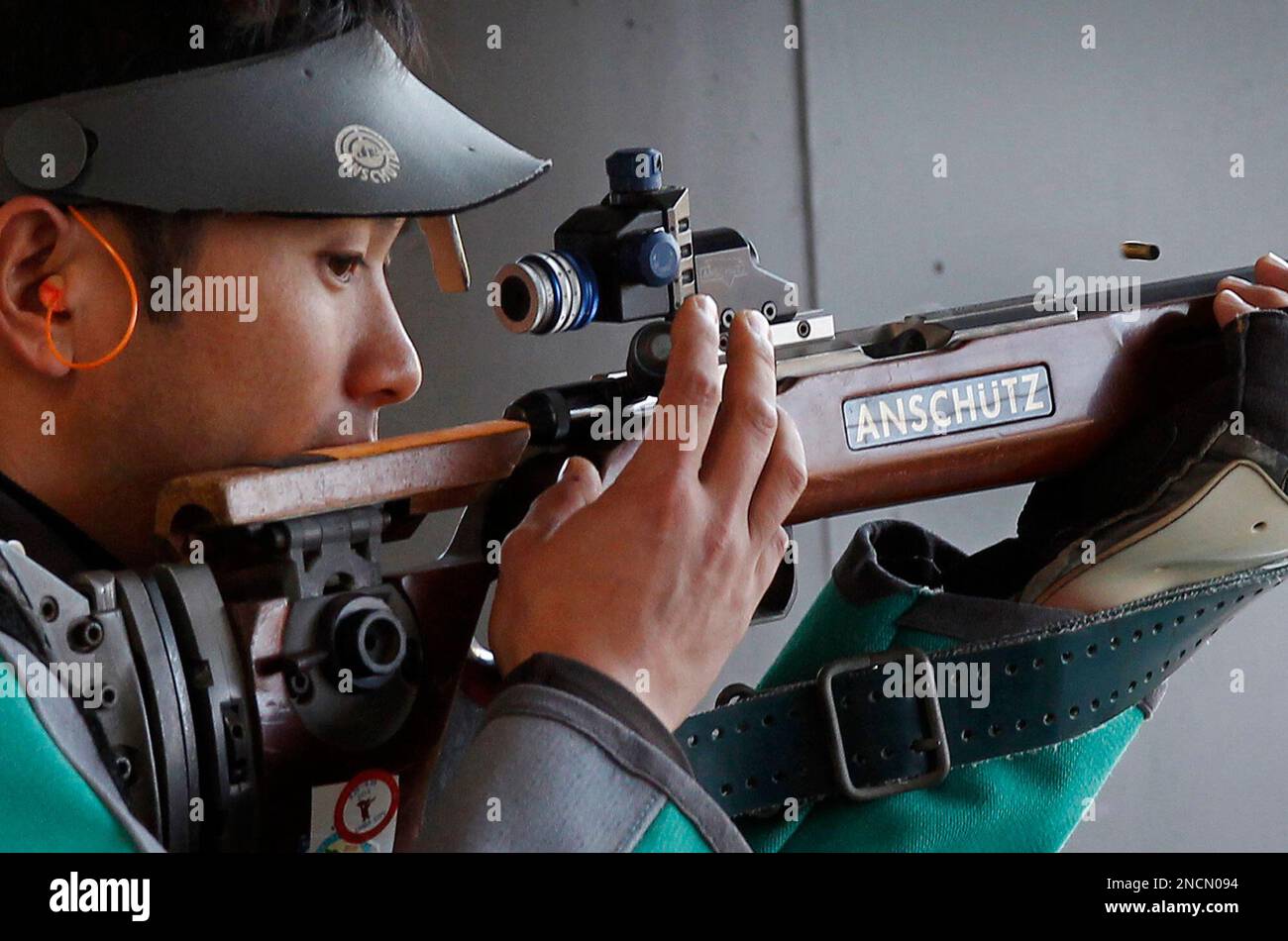 Midori Yajima of Japan competes in the men's 50-meters rifle 3 ...