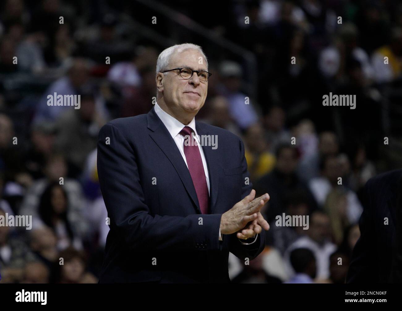Los Angeles Lakers head coach Phil Jackson claps against the Detroit ...
