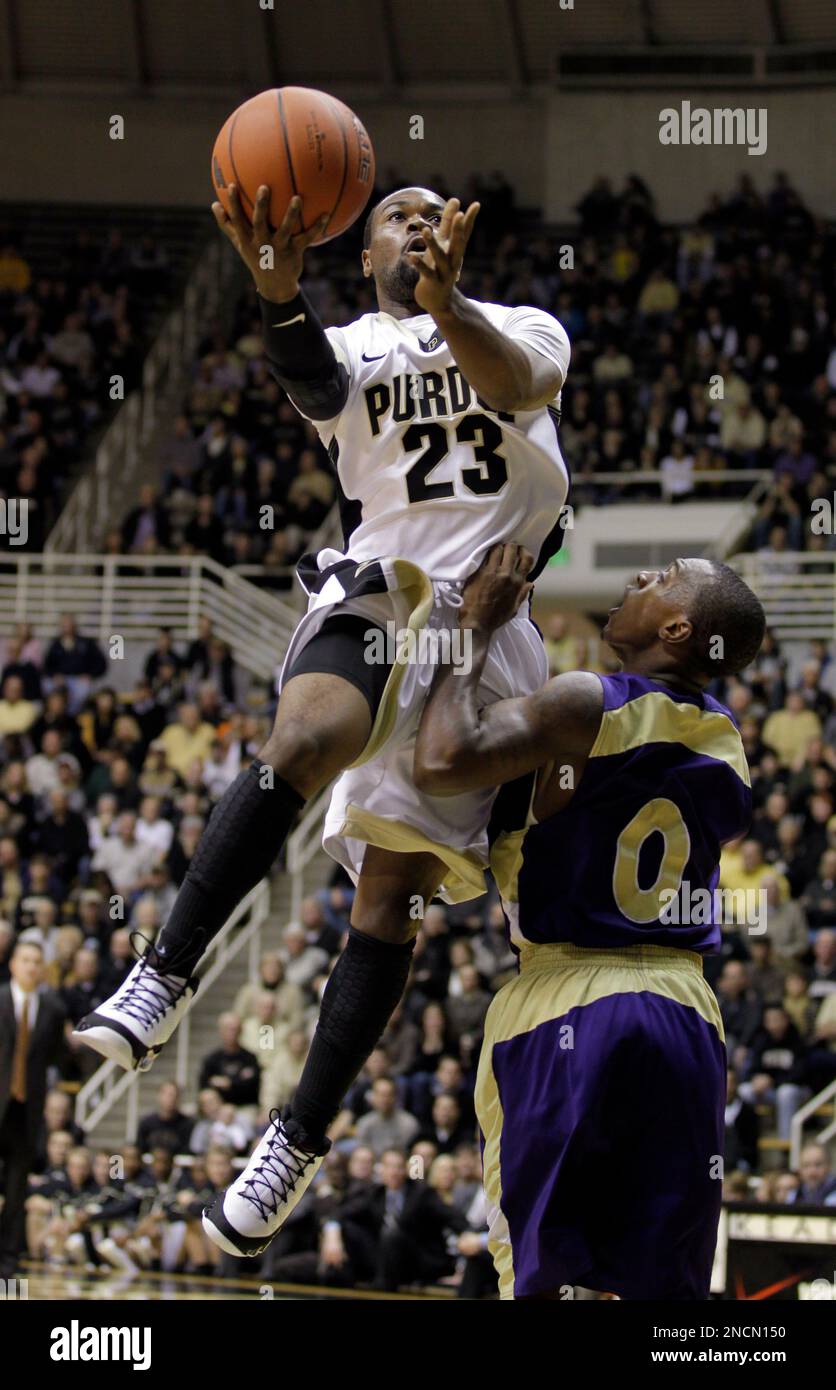 Purdue guard Lewis Jackson shoots over Alcorn State's Kendrick McDonald ...