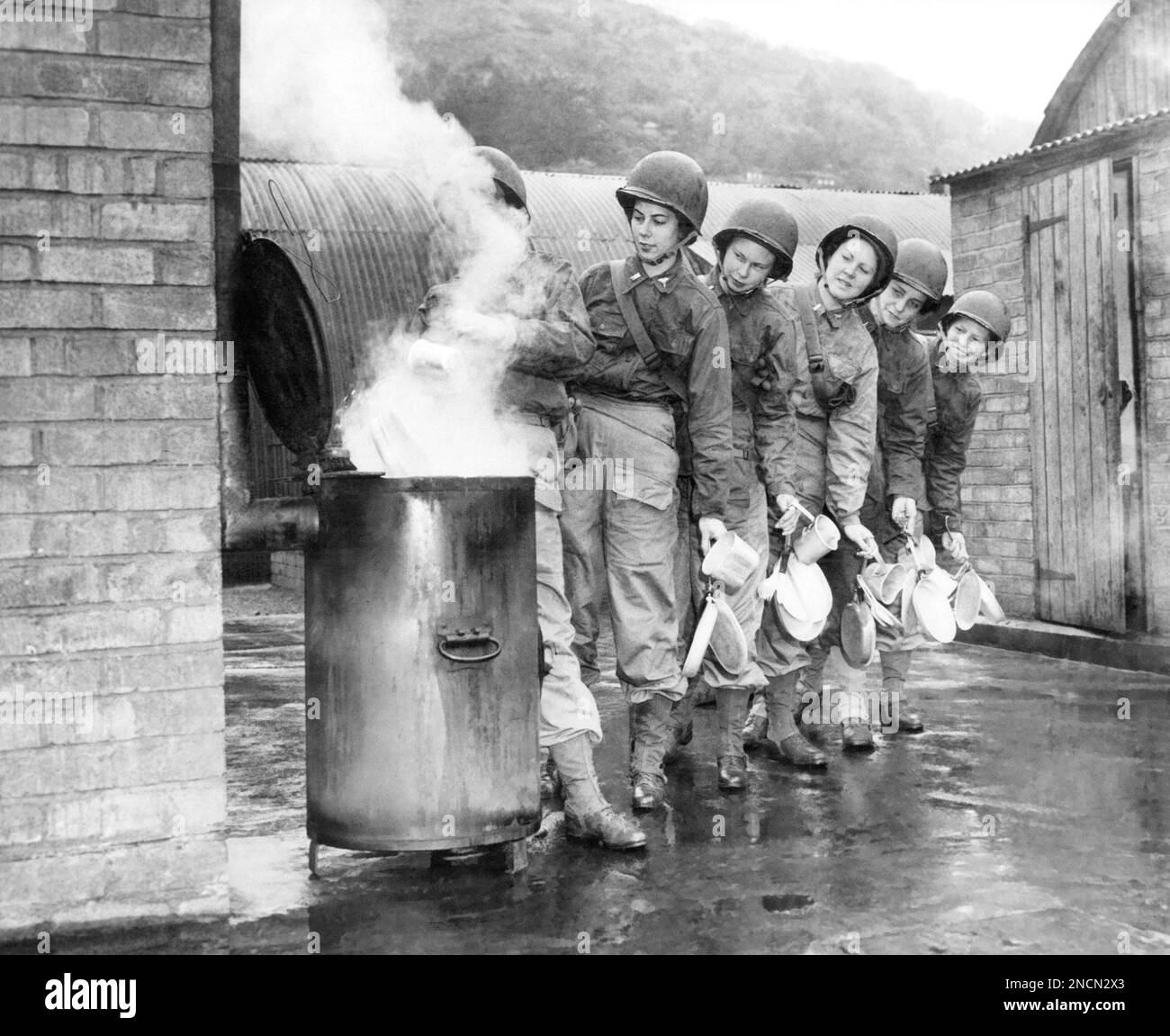 These U.S. Army nurses, stationed in Wales, May 24, 1944, line up to ...