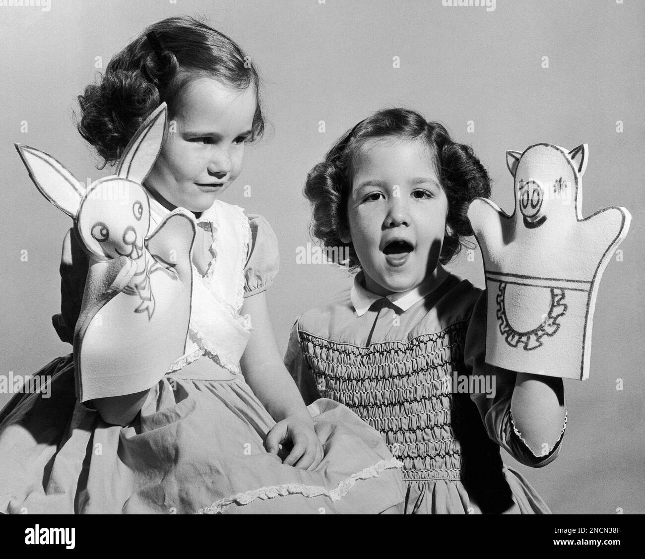 Hand puppets, easy to make at home, are manipulated by Sean Mason, 5 ...