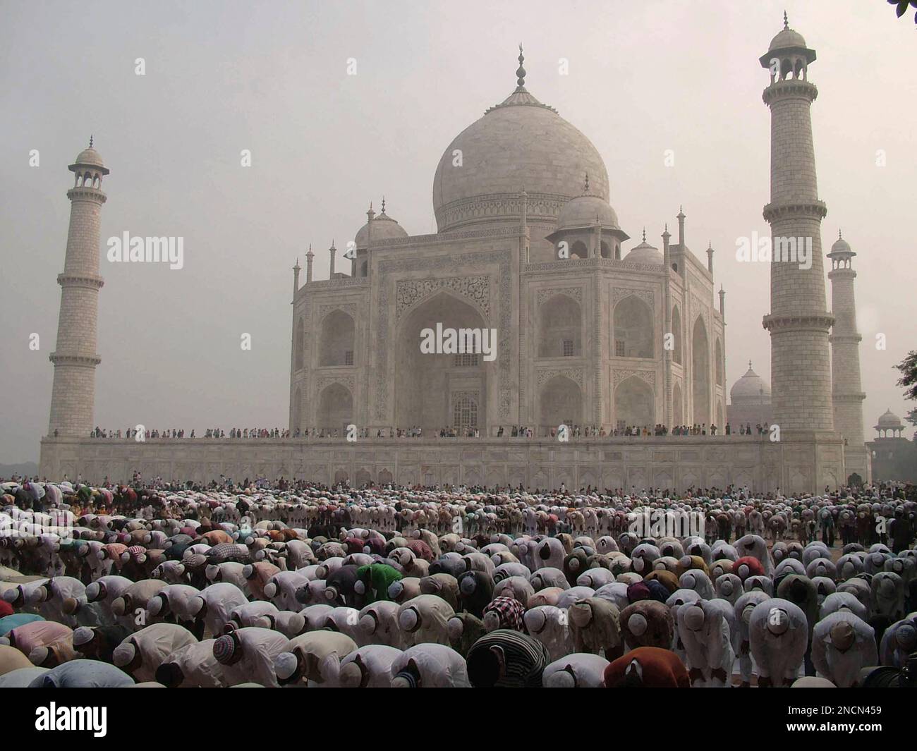 Indian Muslims offer prayers on Eid al-Adha at a Mosque at the Taj ...