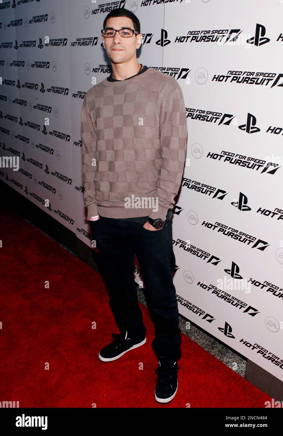 Anis Cheurfa poses on the red carpet at the Electronic Arts' "Need for ...