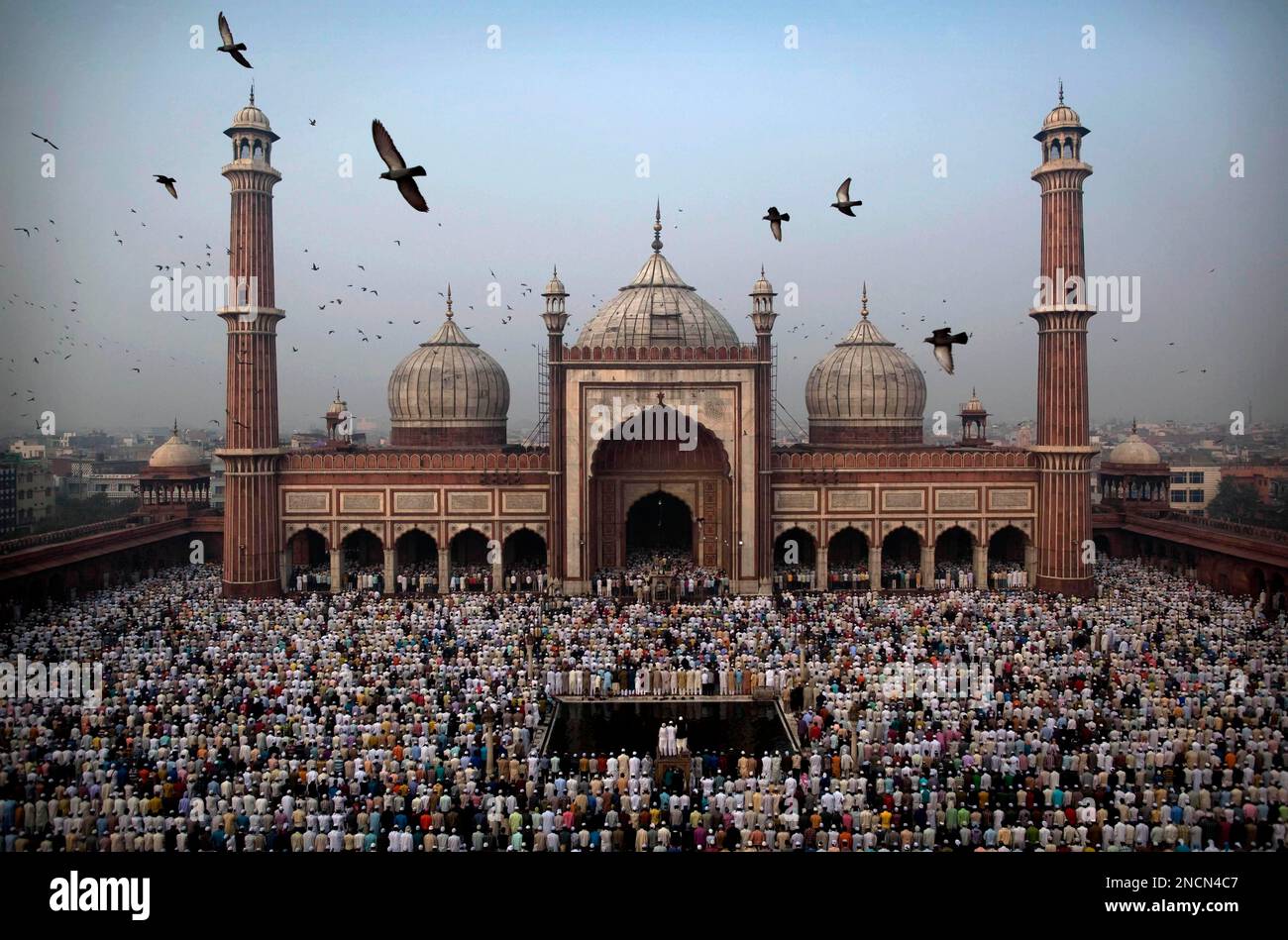 Indian Muslims pray at the Jama Masjid mosque, one of India's largest ...