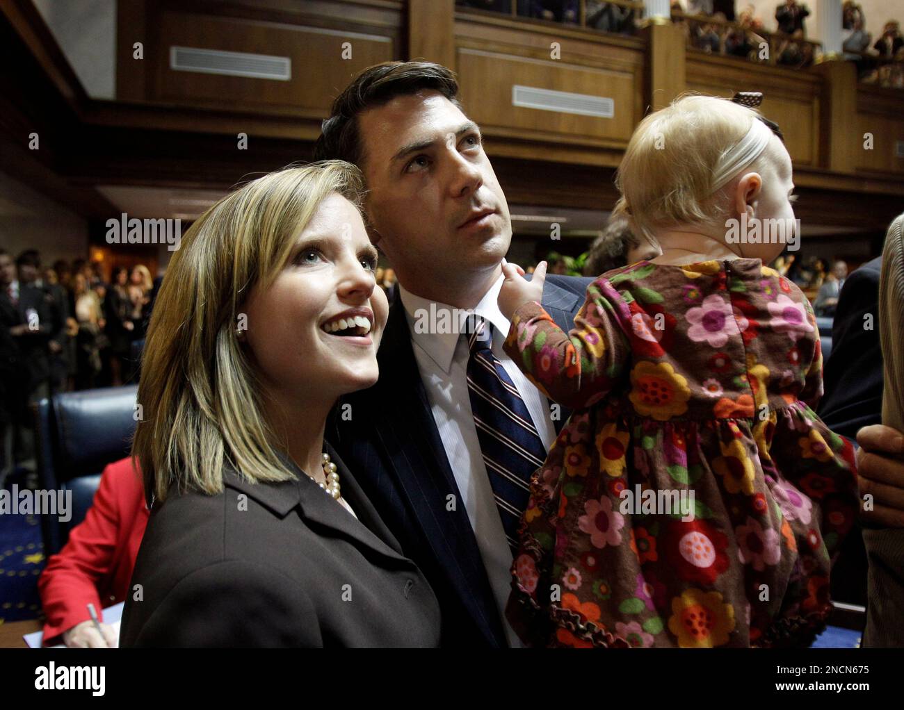 Indiana Republican Sen. Jim Banks, holds his daughter, Lillian, while ...