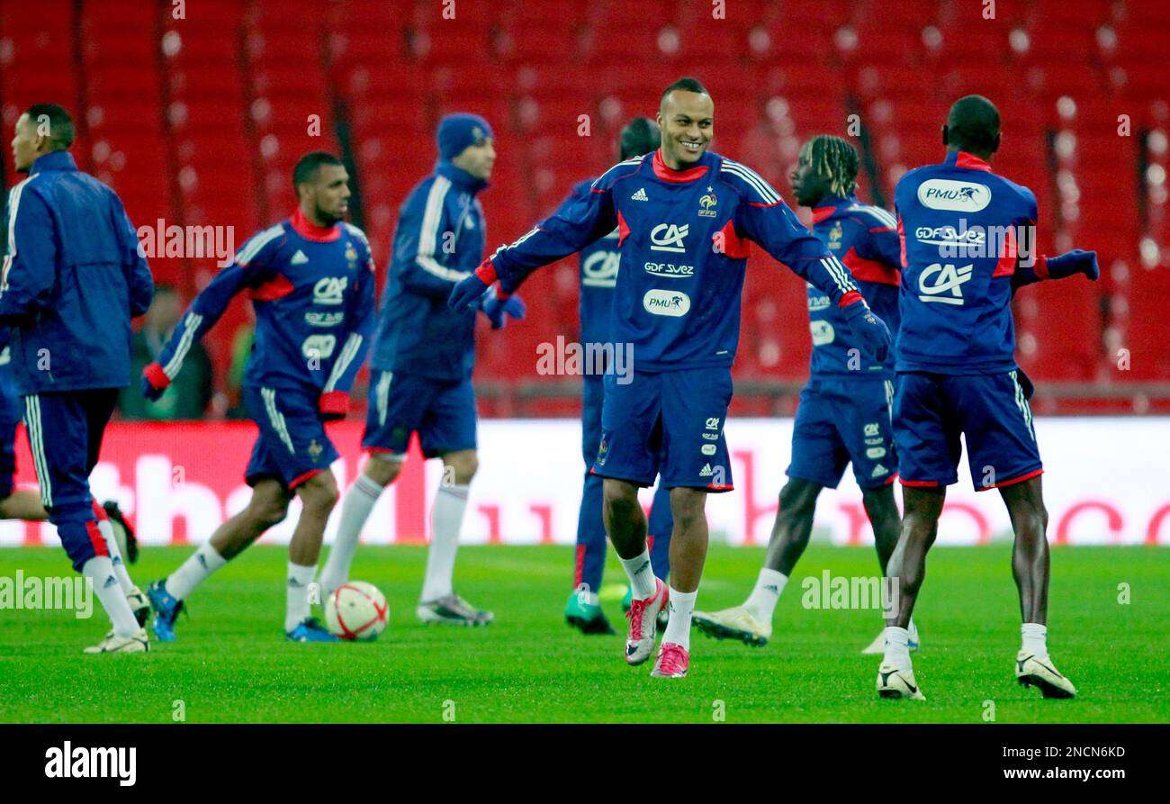 France's Younes Kaboul, center, takes part in a training session at ...