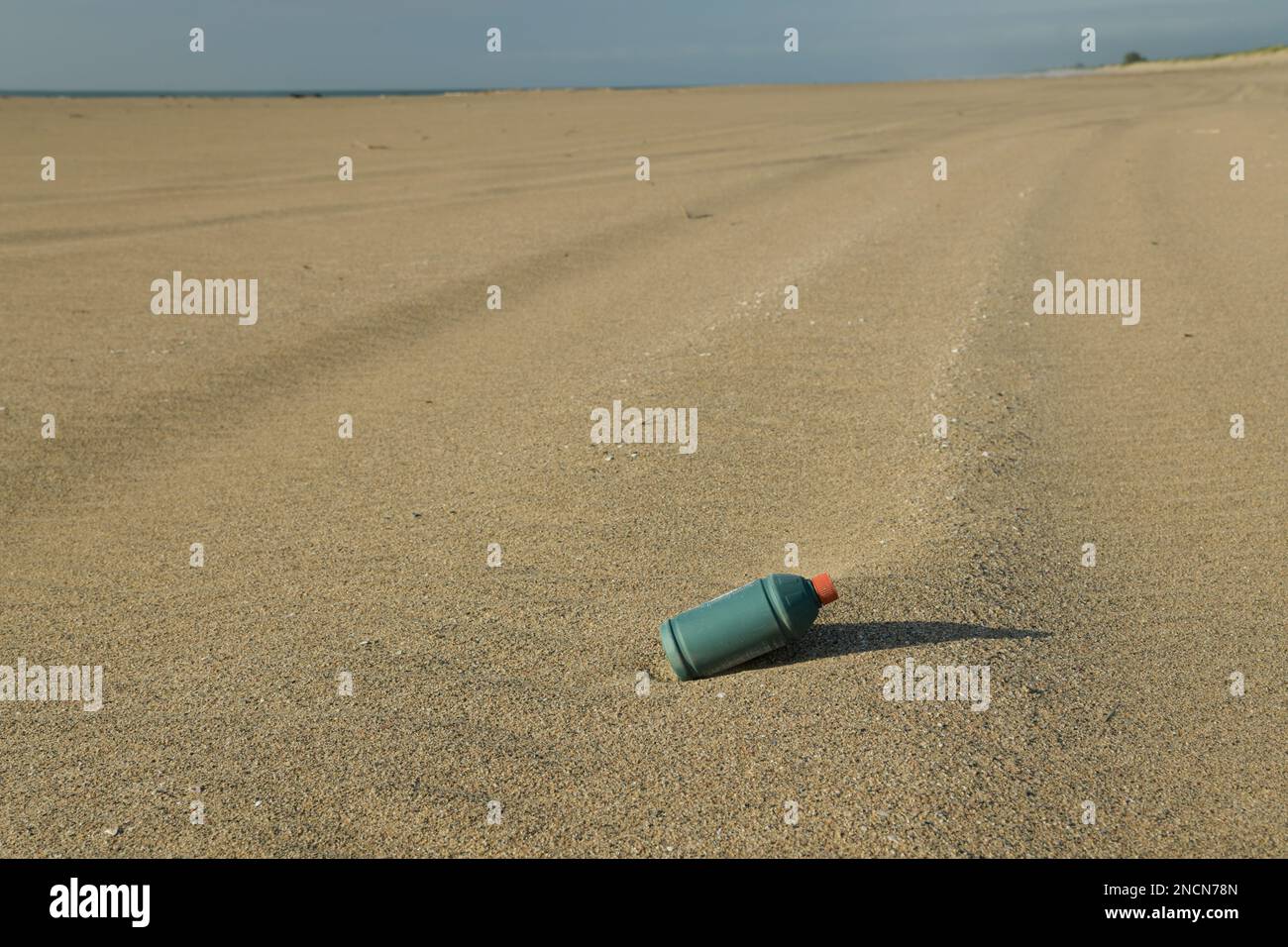 Single use plastic container washed up on beach, packaging pollution of ...