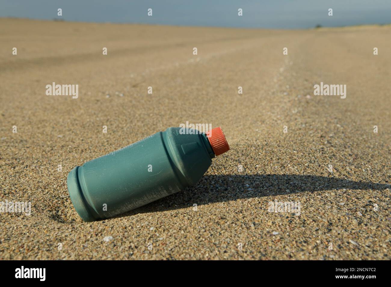 Single use plastic container washed up on beach, packaging pollution of ...