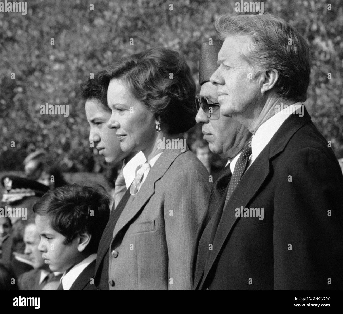 President Jimmy Carter and Mrs. Rosalynn Carter stand with King Hassan ...