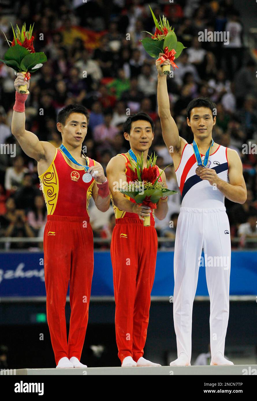 Medalist in the men's pommel horse from left, China's Yang Mingyong ...
