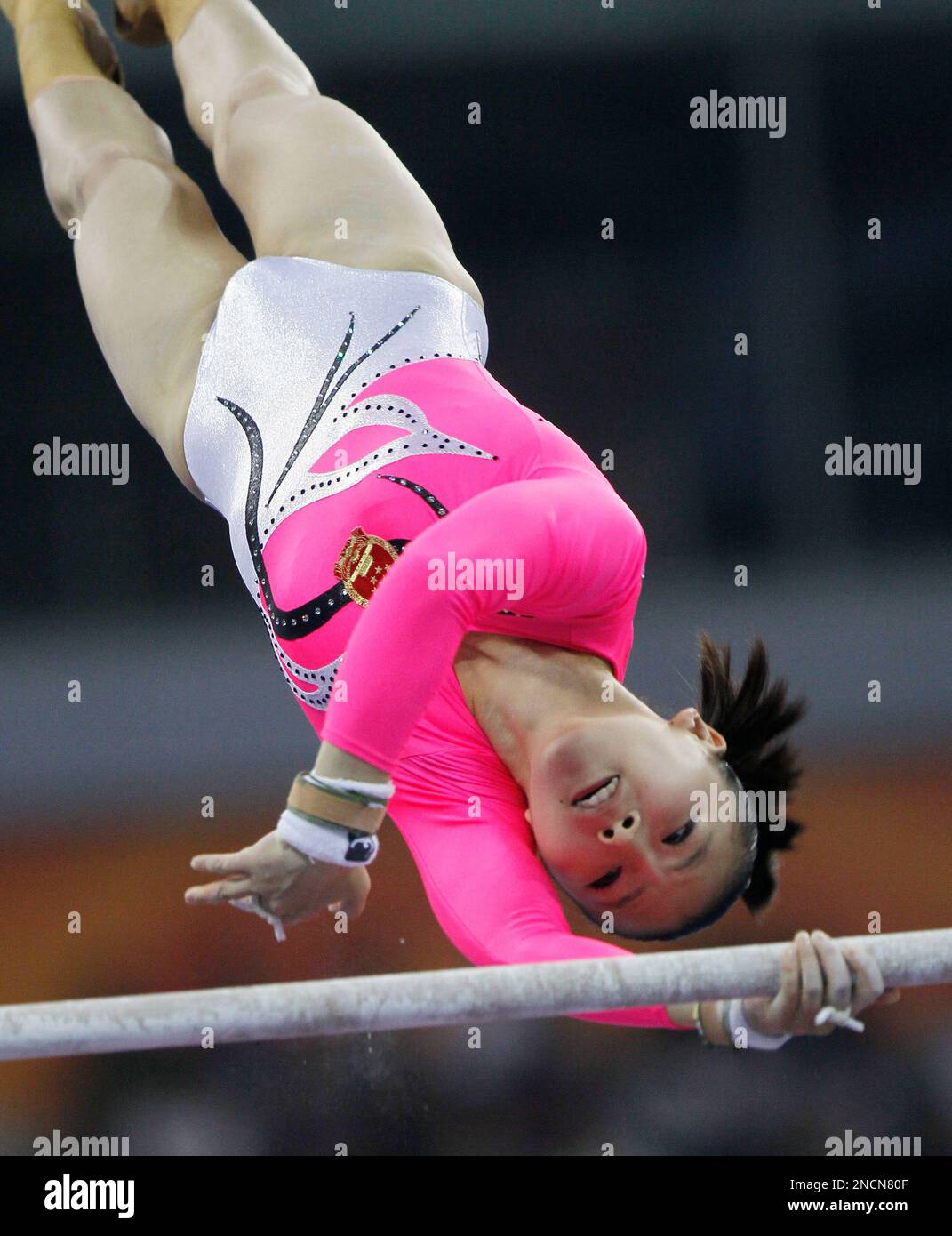 China's gold medal gymnast He Kexin in action on the women's uneven ...