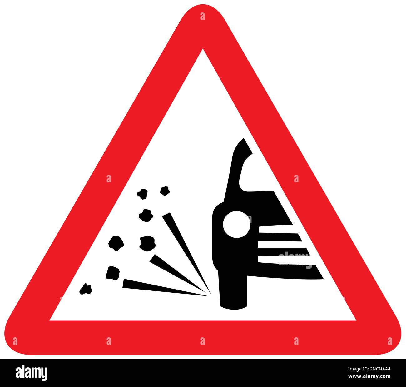 Loose chippings on road ahead British road sign Stock Photo - Alamy