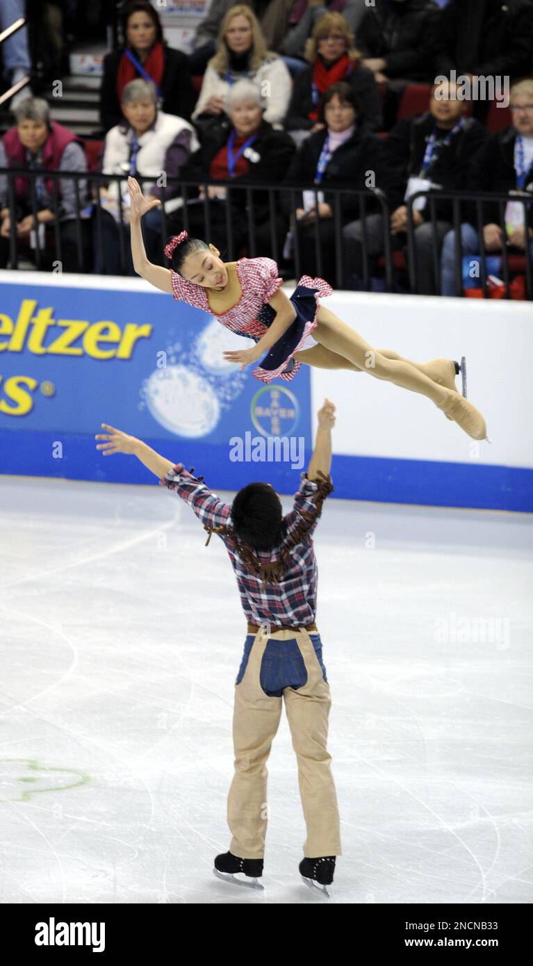 China's Wenjing Sui and Cong Han compete in the pairs short program at ...