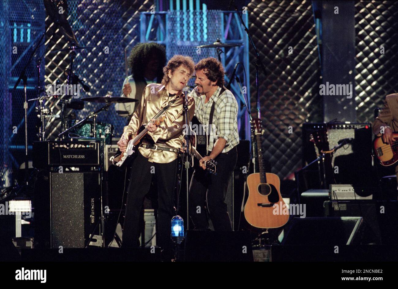 Bob Dylan is joined by Bruce Springsteen, right, during Dylan's set for ...