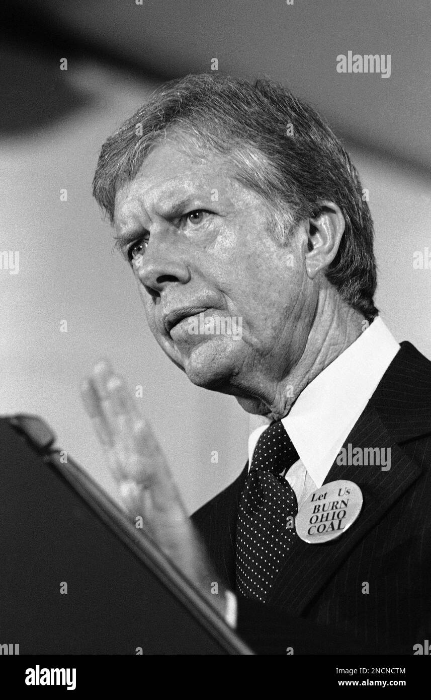 President Jimmy Carter sporting a button supporting Ohio coal, makes a ...