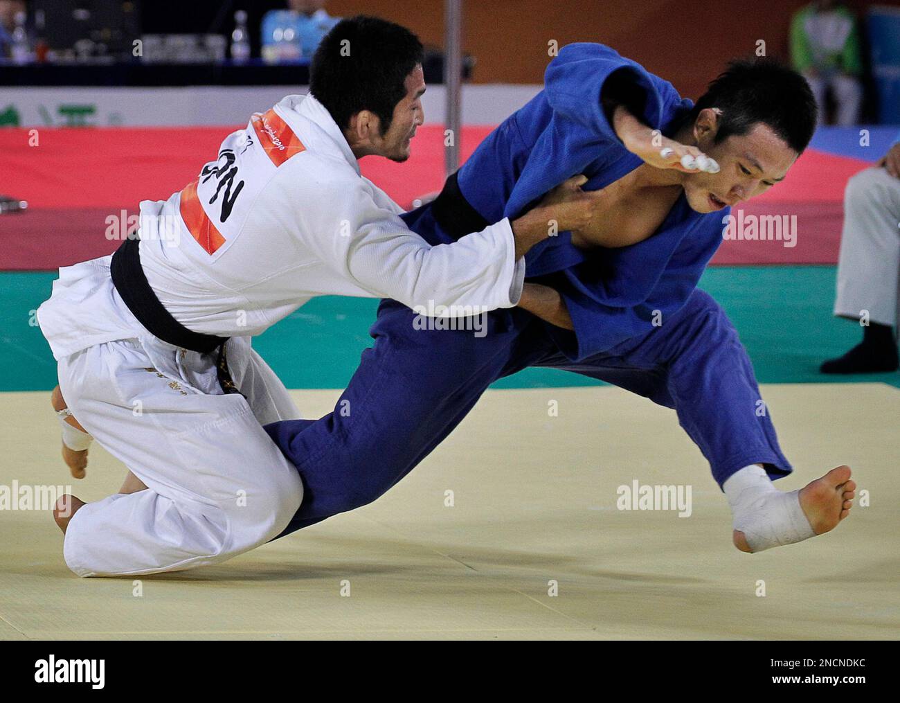 Hiroyuki Akimoto of Japan, left, and Ki Chun Wang of Republic of Korea ...