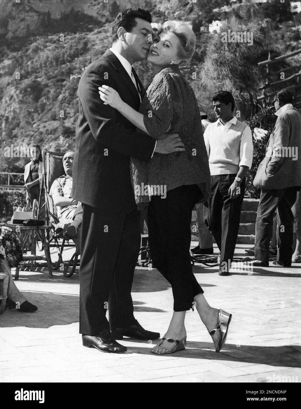 Singer Mario Lanza and actress Zsa Zsa Gabor go into a clinch during ...