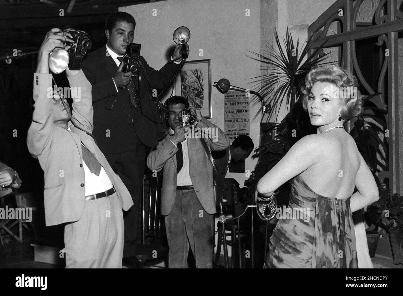 Actress Zsa Zsa Gabor with photographers during a reception on Oct. 2 ...