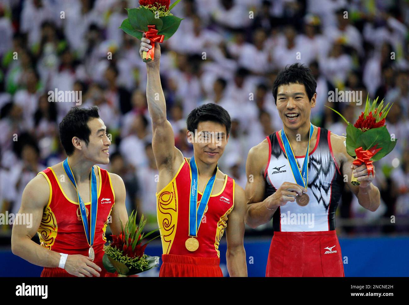 From left, China's Lu Bo, silver, China's Teng Haibin, gold and Japan's ...