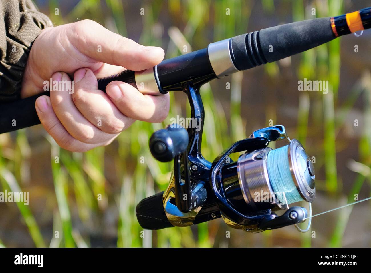 Man hand holding spinner hi-res stock photography and images - Alamy