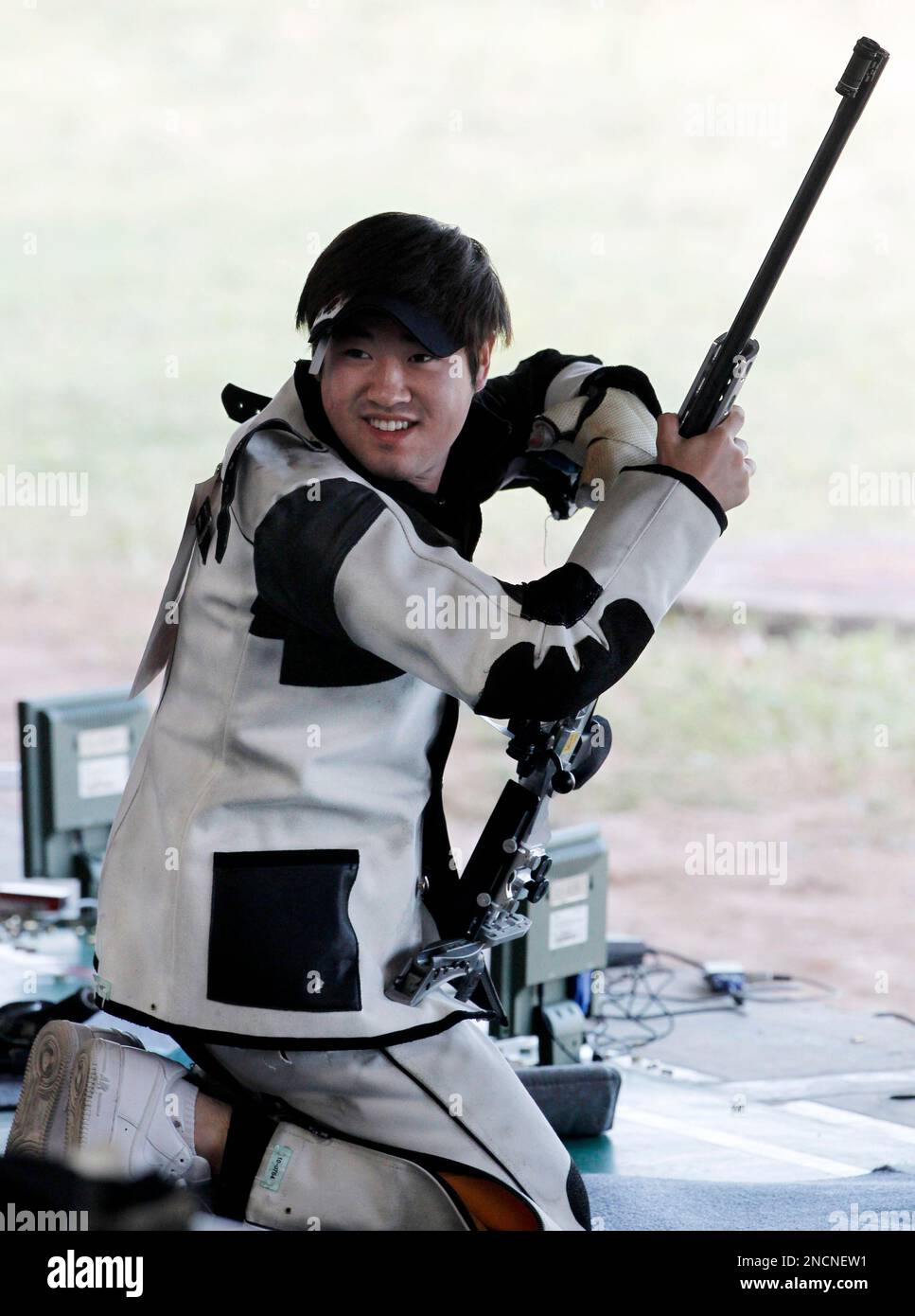 South Korea's Kim Jonghyun reacts, during men's 50-meter rifle prone ...