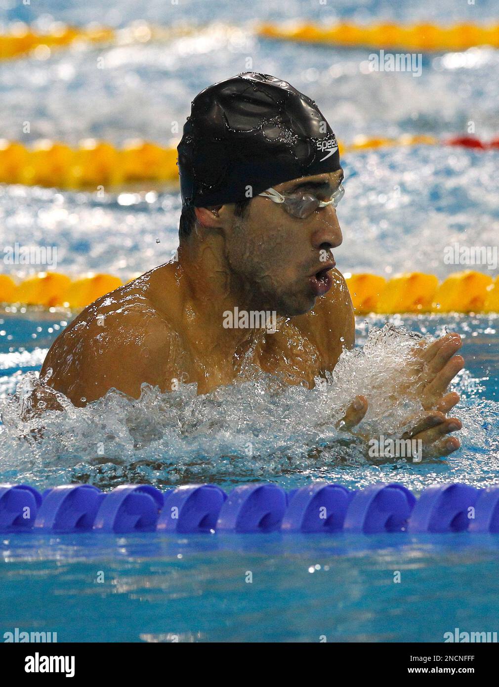 Iran's Mohammad Alirezaei Dizicheh swims in a men's 100m Breaststroke heat, at the16th Asian ...
