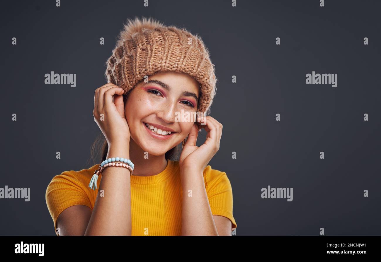 Keeping up with the latest trends. Cropped portrait of an attractive ...