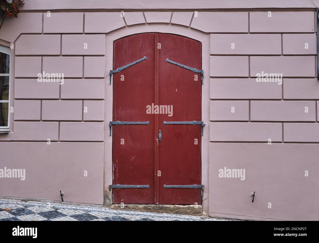 Old Wooden door Heavy duty hinges in ancient medieval design touristic ...