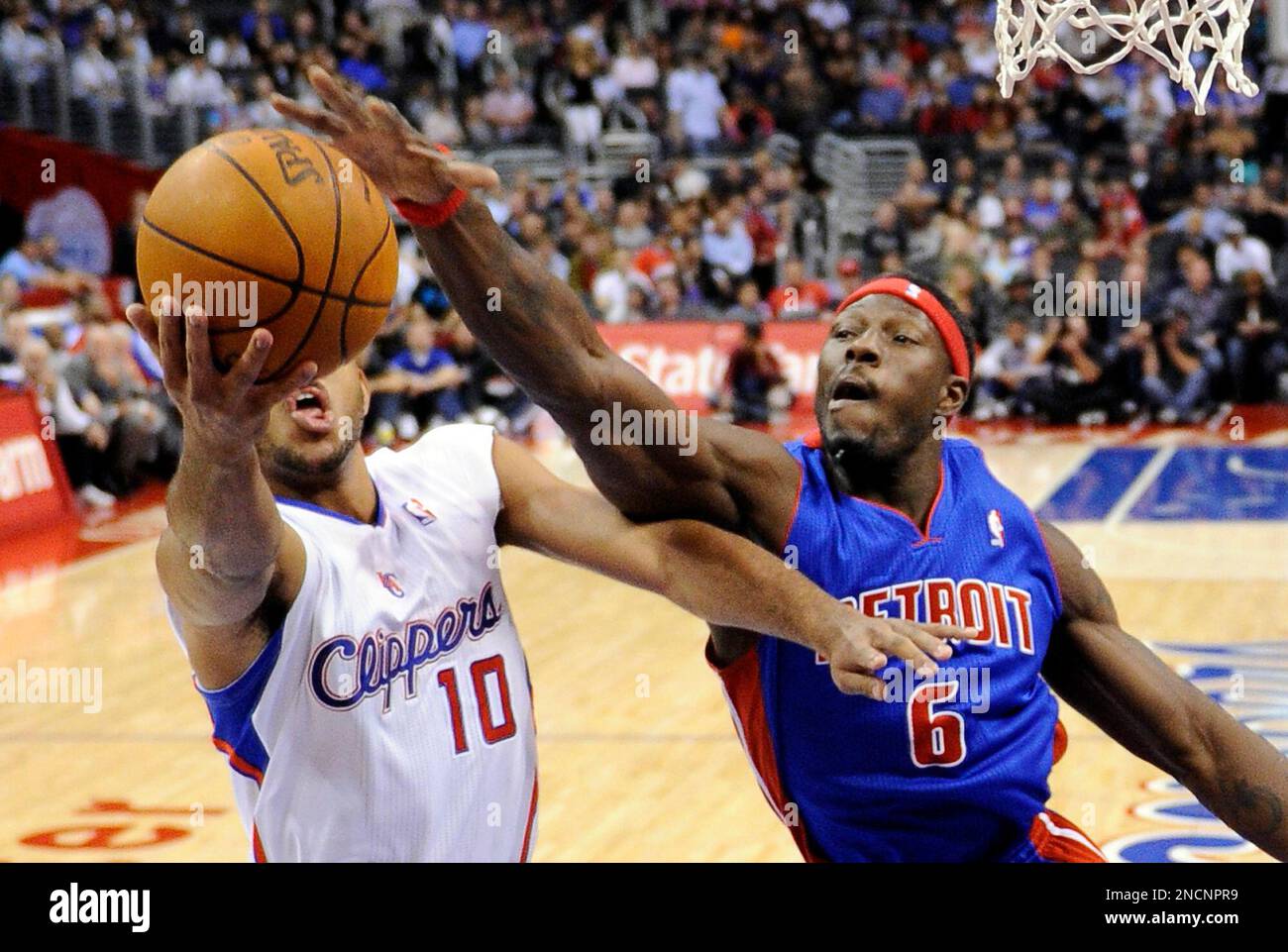Los Angeles Clippers guard Eric Gordon, left, puts up a shot as Detroit ...