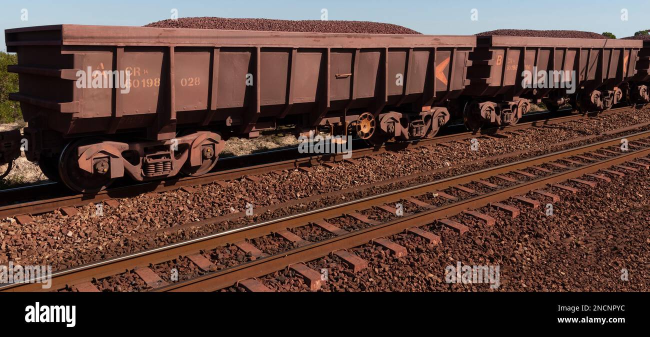 Saldanha Bay, west coast, South Africa. 2023. Railway wagons carrying ...