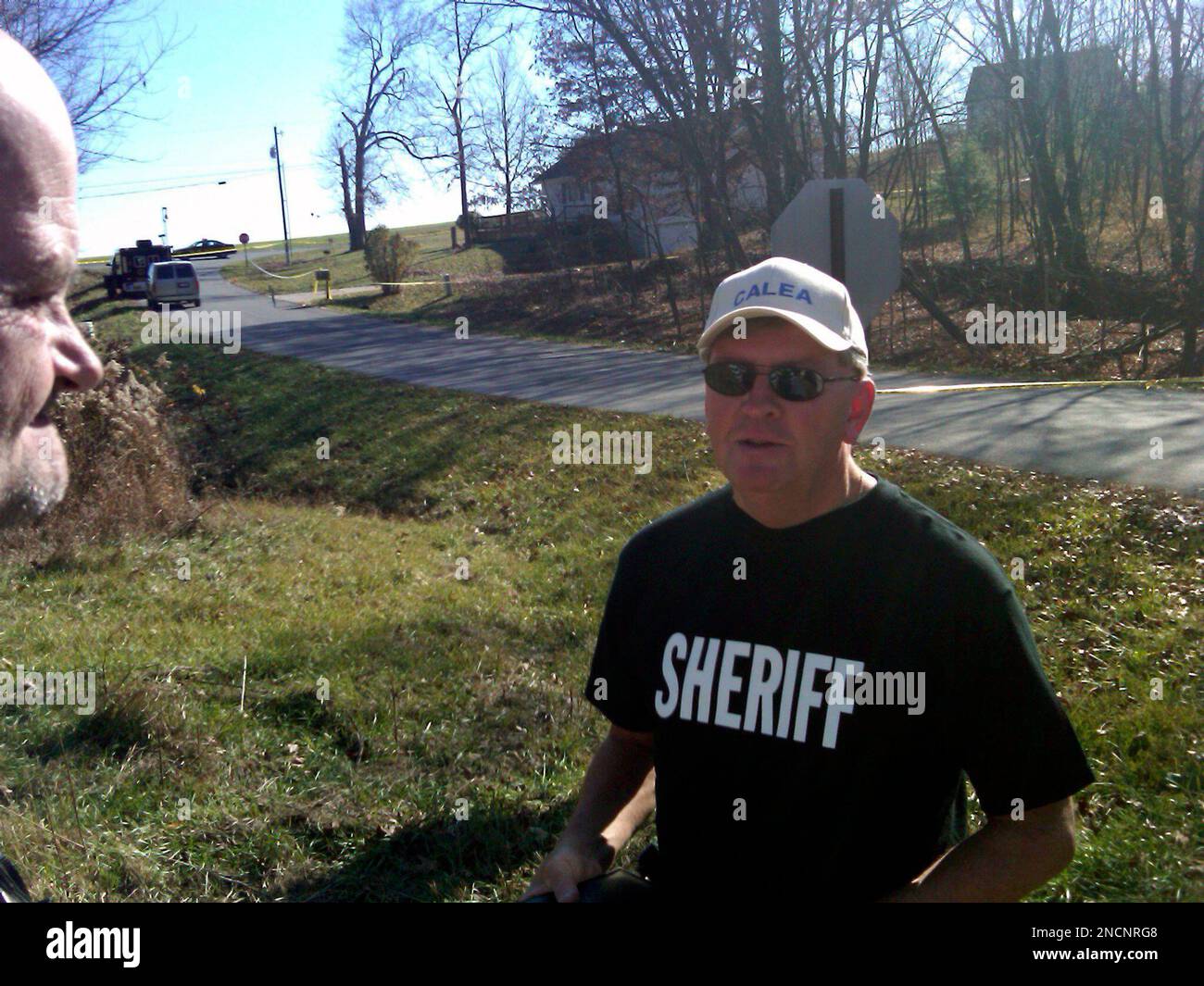 Knox County Sheriff David Barber, right, talks with reporters, Saturday ...
