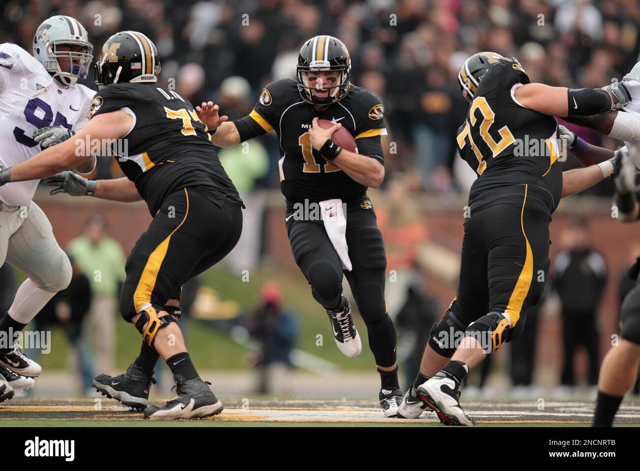 Missouri quarterback Blaine Gabbert runs with the ball during the ...