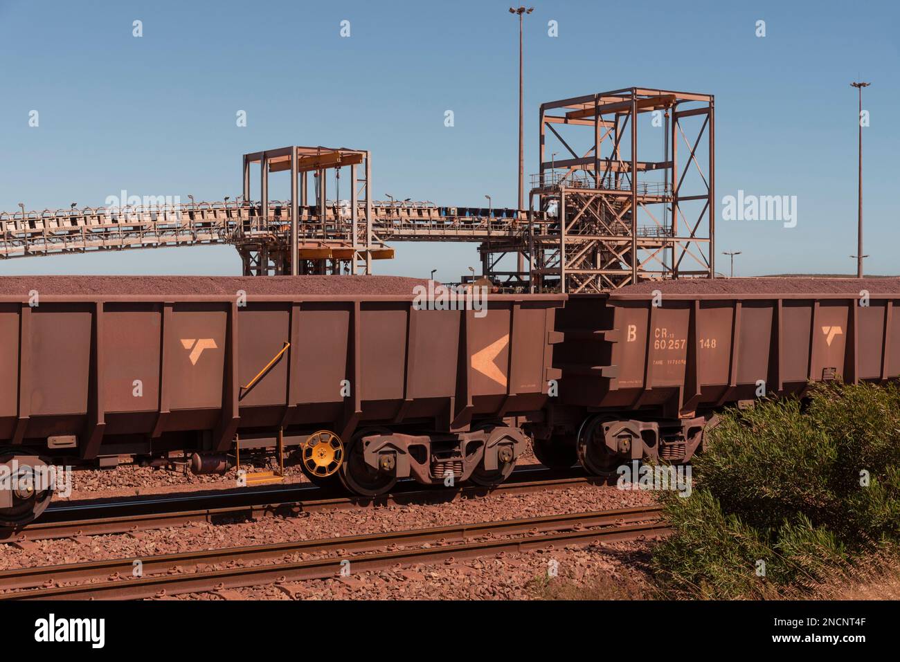 Saldanha Bay, west coast, South Africa. 2023. Railway wagons carrying ...