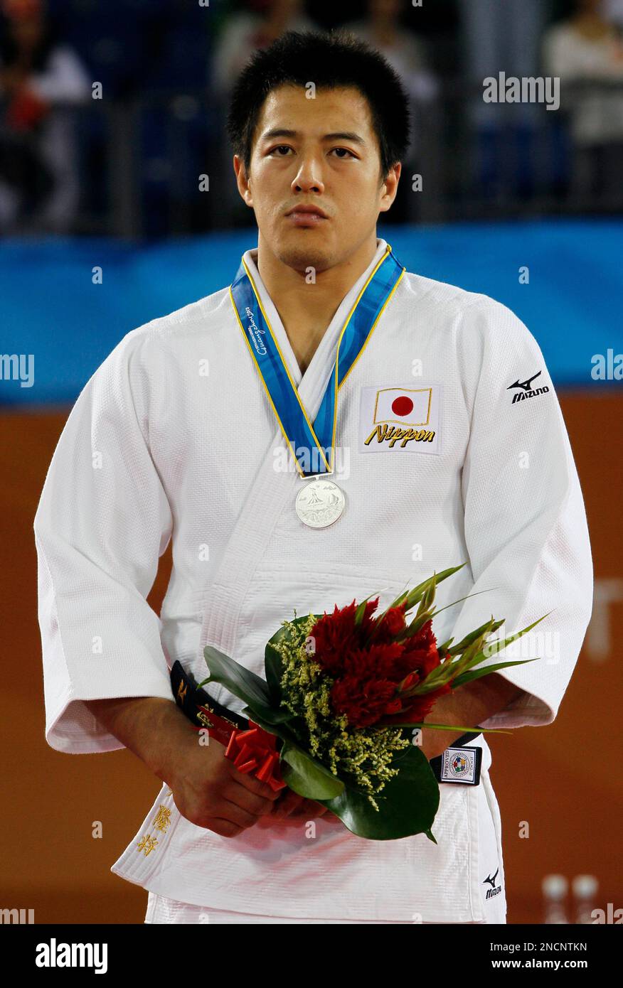 Japan's Takamasa Anai wears his silver medal during the medal ceremony ...
