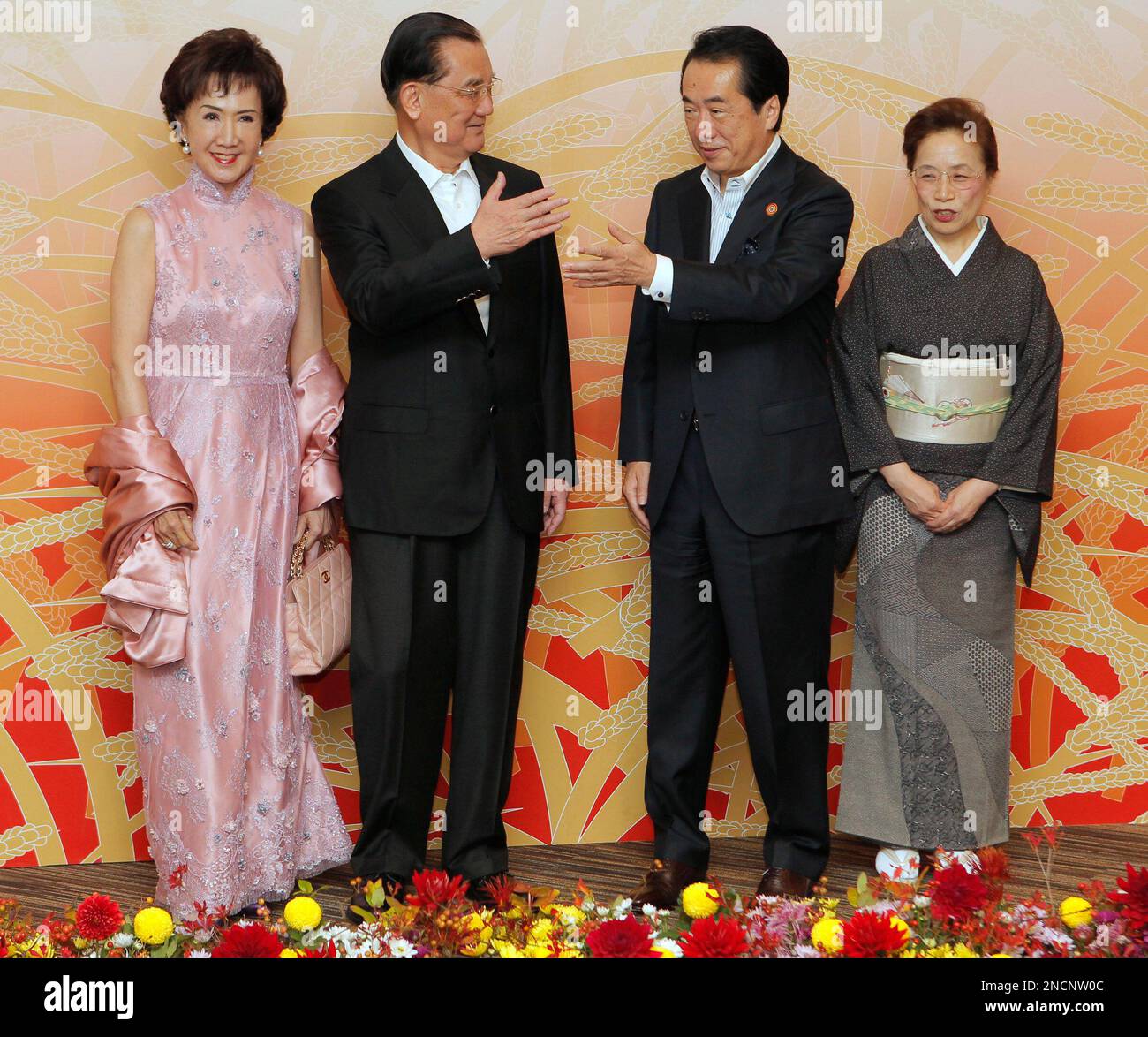 Taiwan's National Policy Foundation Chairman Lien Chan, second left ...