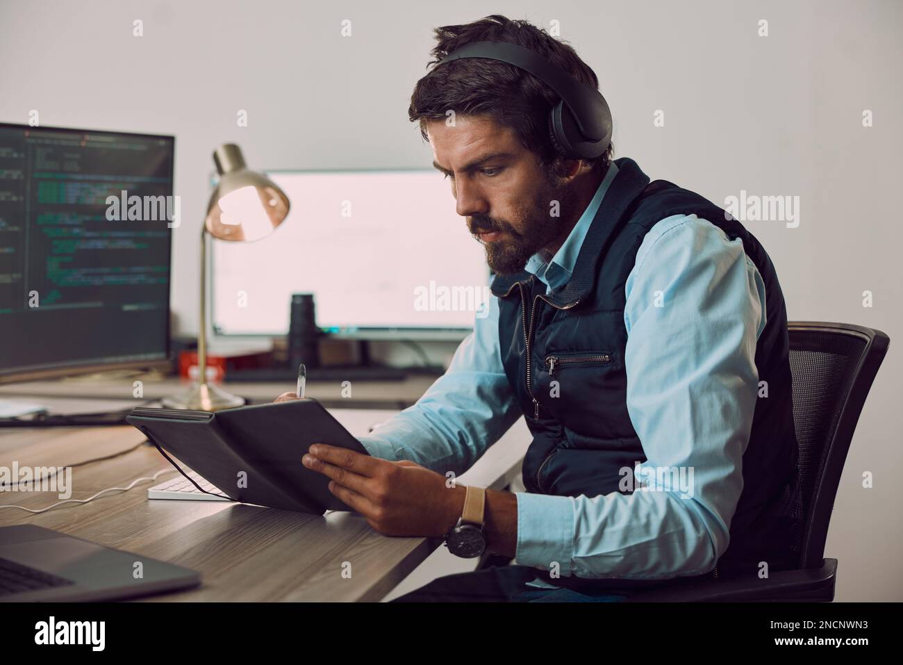 Coding Man Writing Notes And Programmer Software Update And Work Night With Information