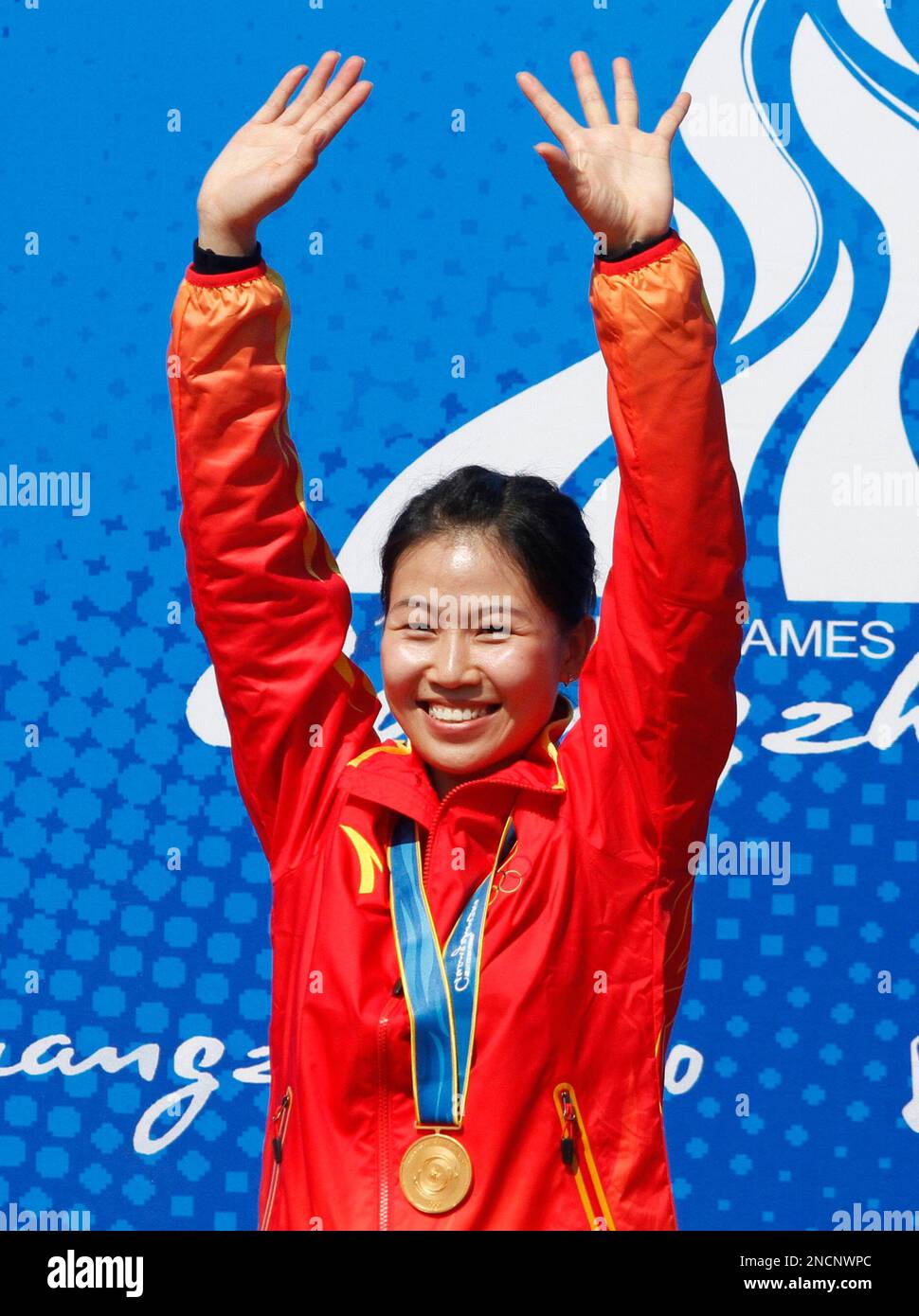 Yi Siling of China celebrates after winning the gold medal in the women ...