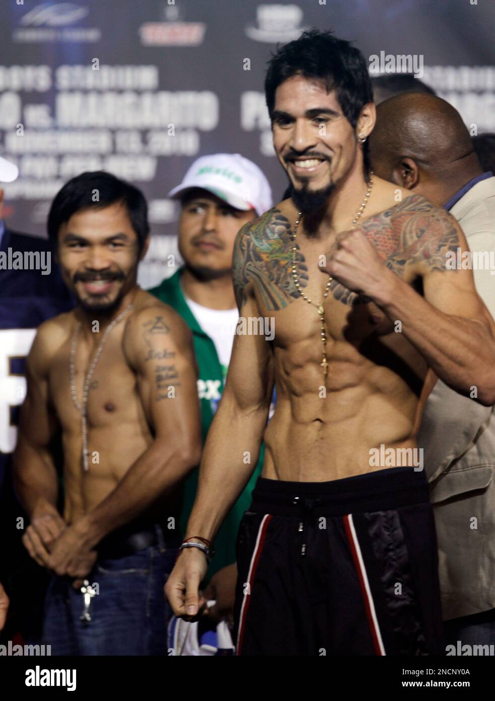 As Antonio Margarito, right, of Mexico, poses for a photo, Manny ...