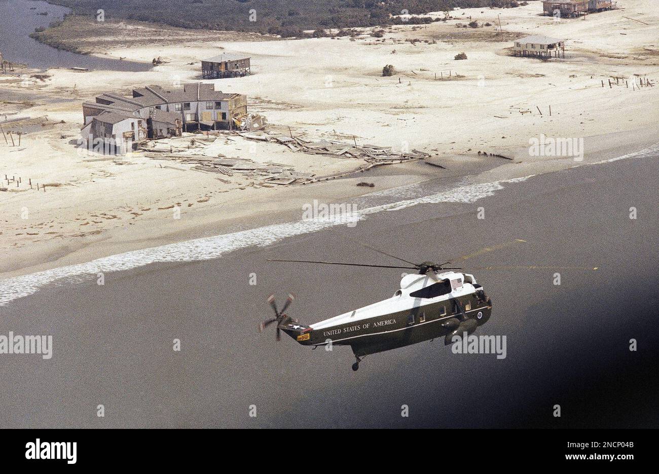 President Jimmy Carter in helicopter flew over areas in south damaged ...