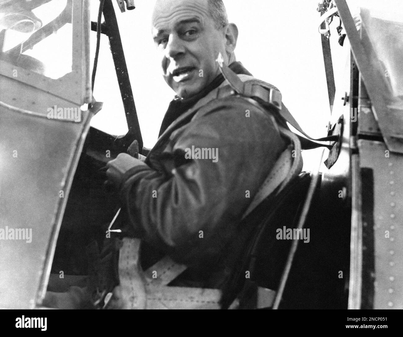 Major General James H. Doolittle of Tokyo raid fame, straps himself ...