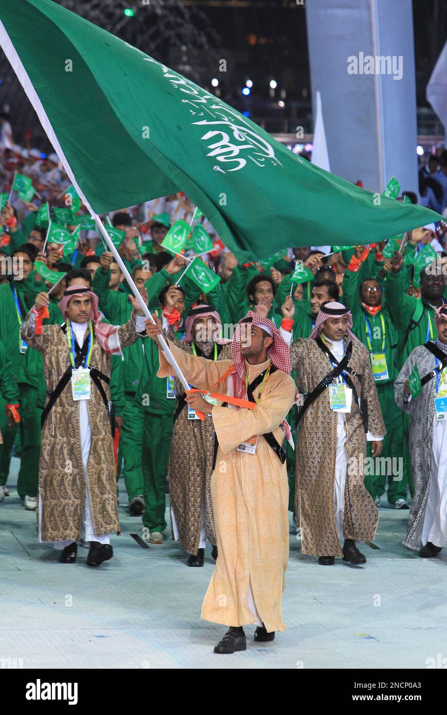 The Saudi Arabian team march into the opening ceremony for the 16th ...