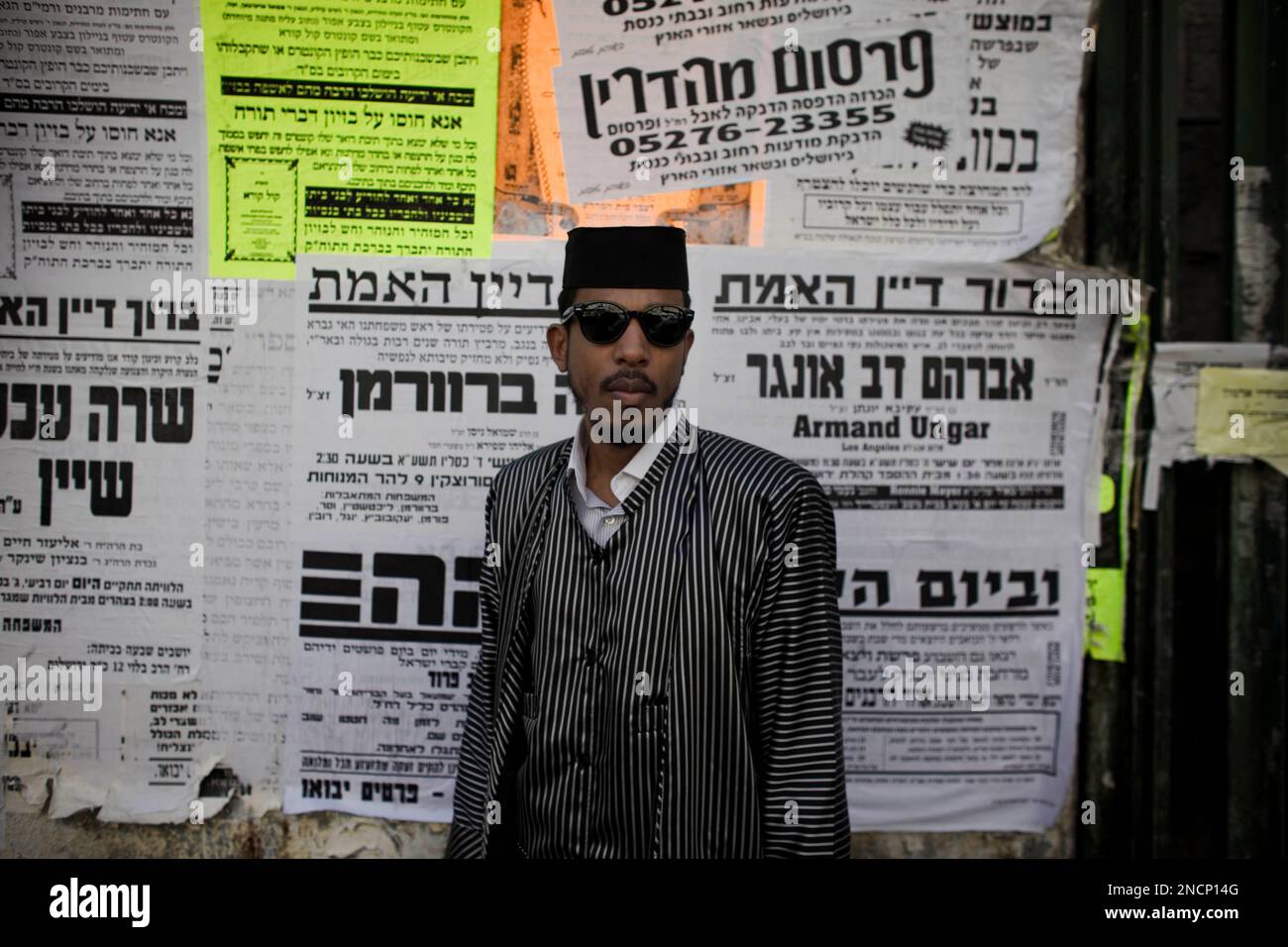 U.S. rapper Jamal "Shyne" Barrow poses for a picture in front of ...