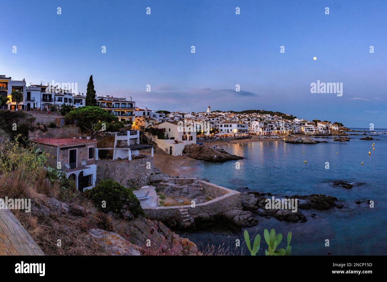 The beaches, Platgeta de Calella, Platja d’en Calau at dusk Stock Photo ...
