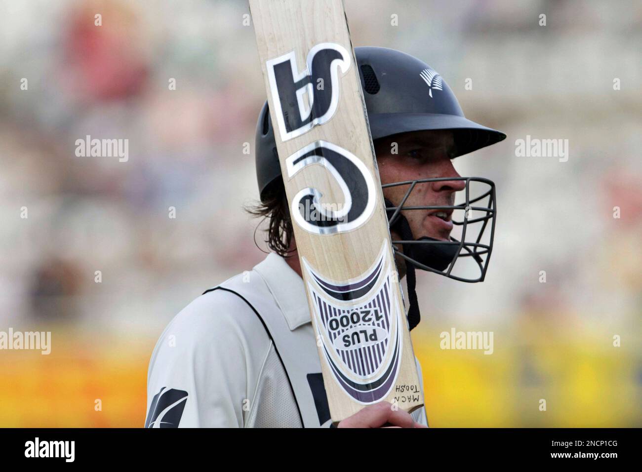 New Zealand's Tim McIntosh returns to the pavilion after being dismissed on the first day of the ...