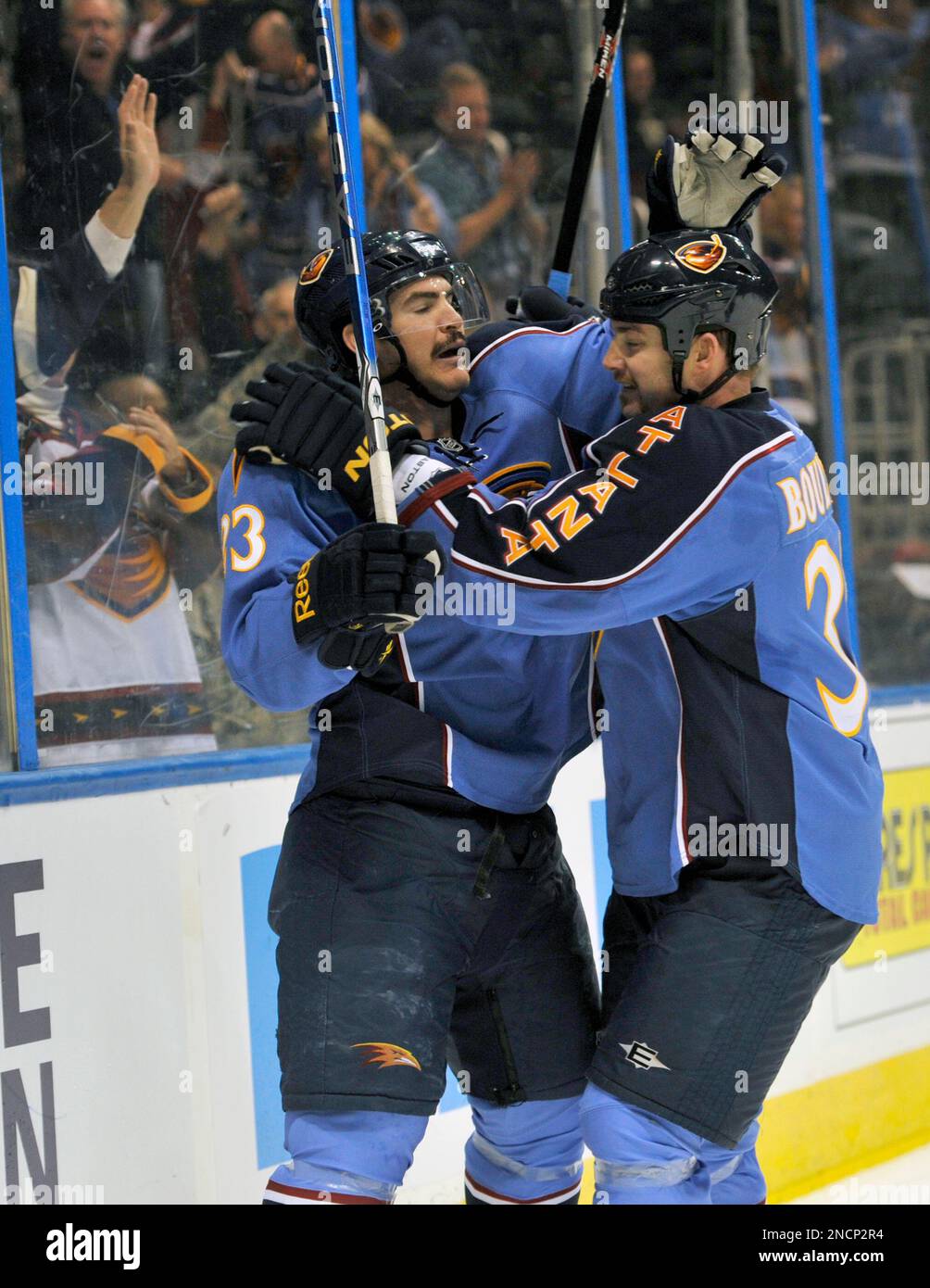 Atlanta Thrashers center Jim Slater, left, celebrates his goal against ...