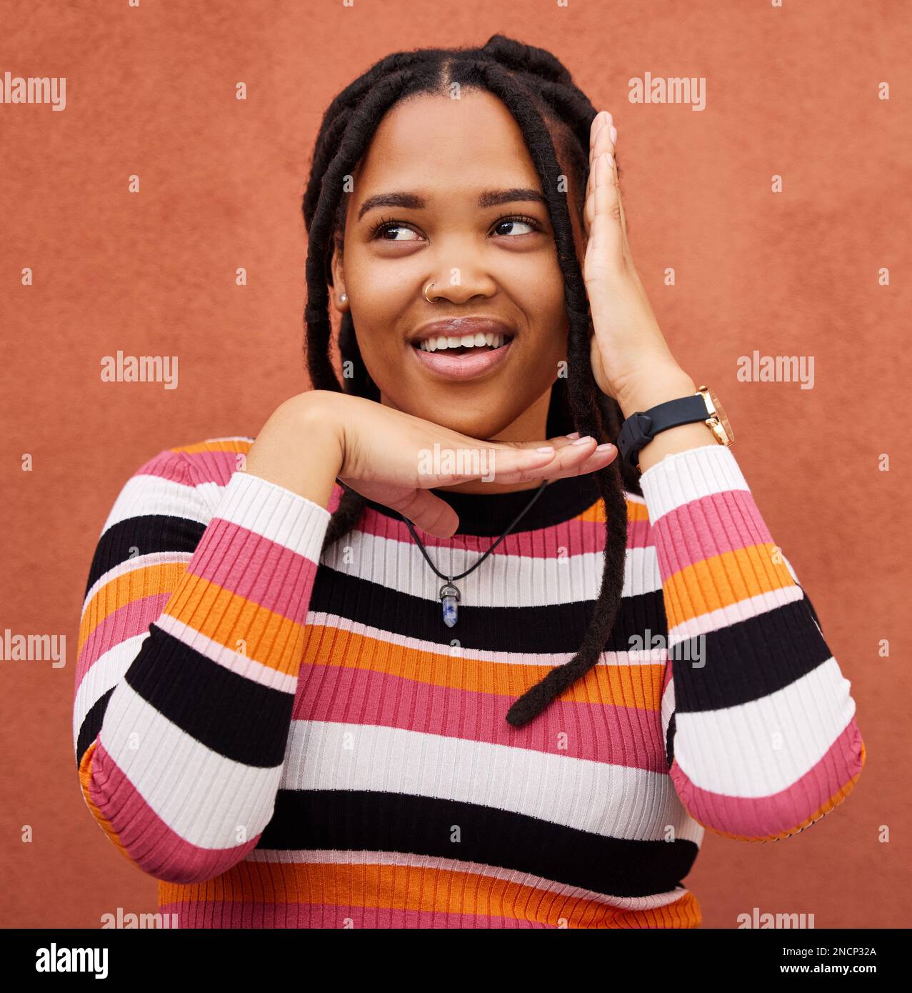 Smile, frame and hands by face of black woman for focus, perspective ...